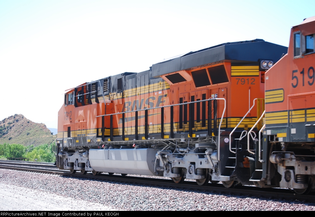 BNSF 7912 rolls past me as she heads down the Cajon Pass towards San Bernardino, Ca.